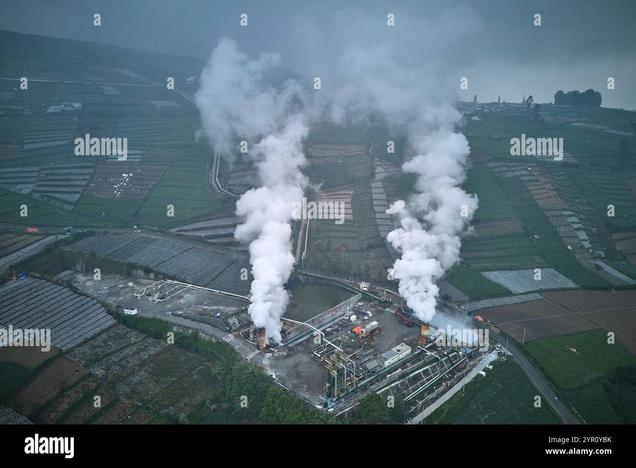 Steam rises from a geothermal power plant in Dieng, Central Java ...