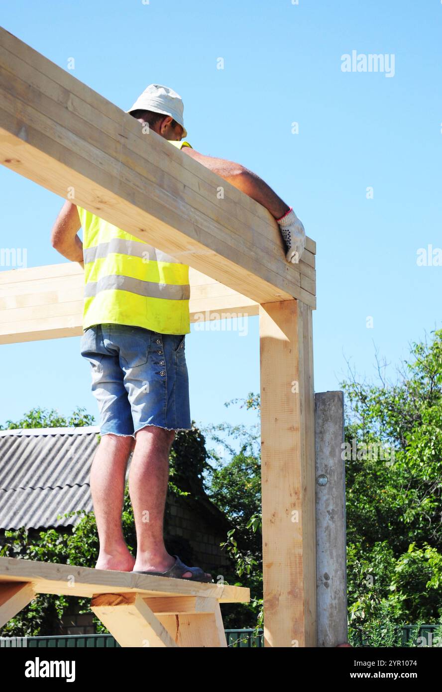 Roofer Building Wood Trusses Roof Frame House Construction. Roofing ...