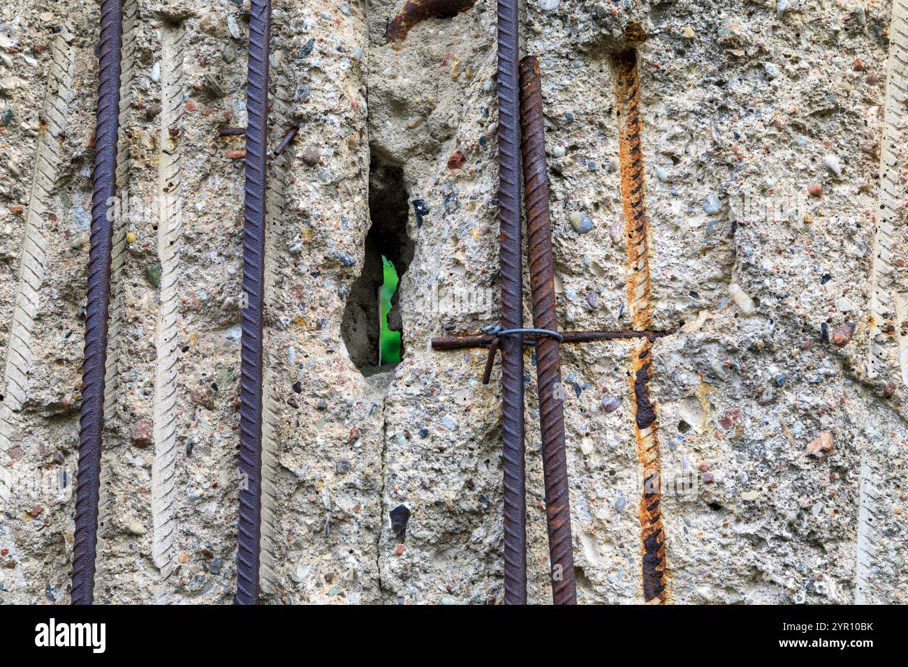 Europe, Germany, Berlin. Rusted rebar and concrete, remaining segment ...