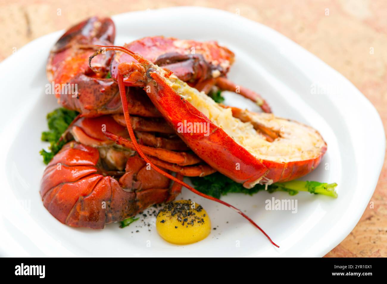 Fresh cooked Atlantic lobster cut in half Stock Photo - Alamy