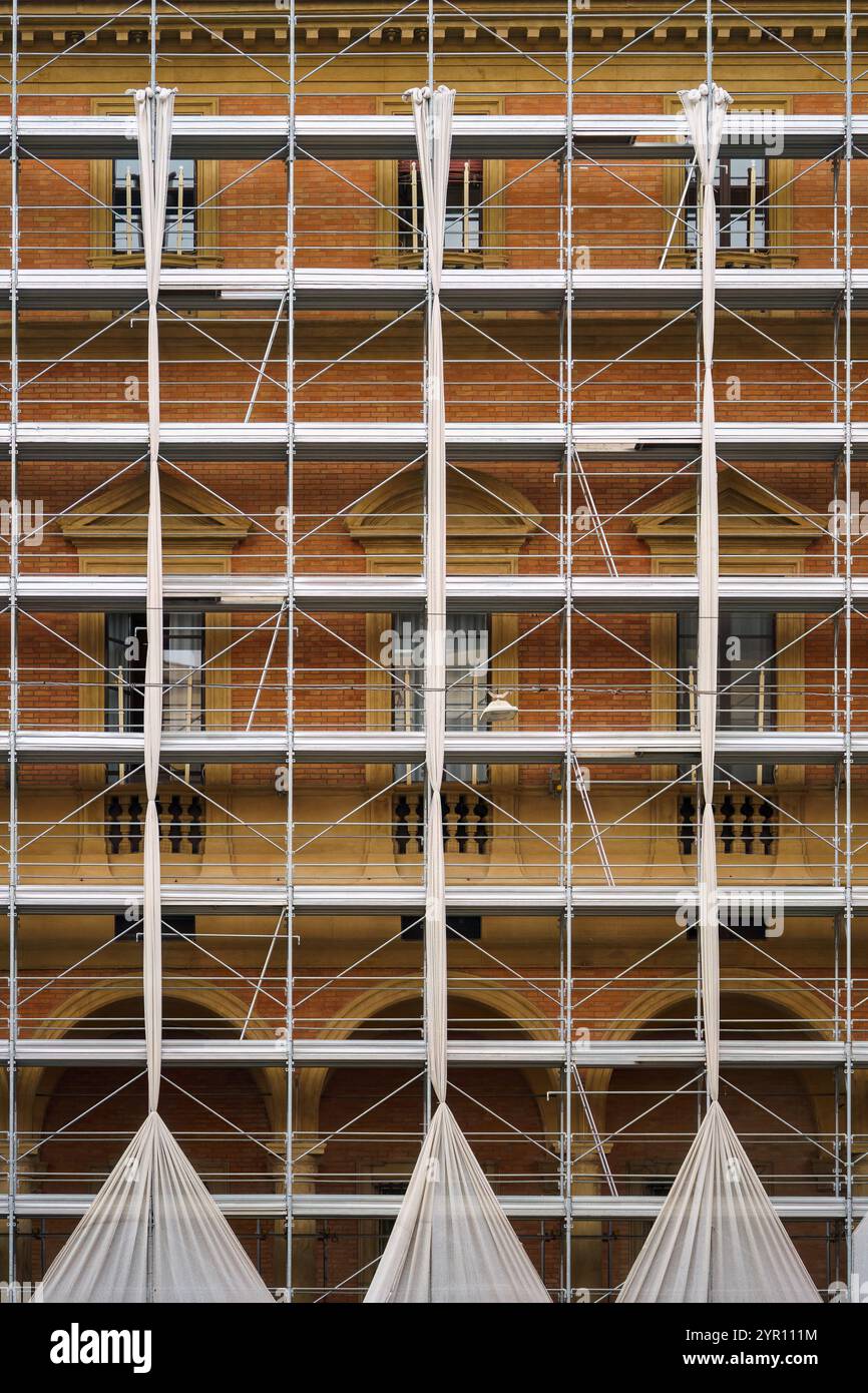 Scaffolding surrounding historic building during restoration process ...