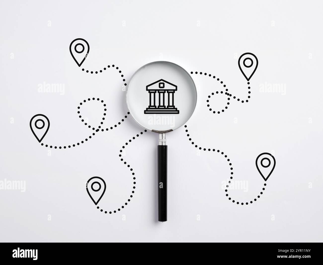 Searching for the location of the nearest bank. Magnifying glass with ...