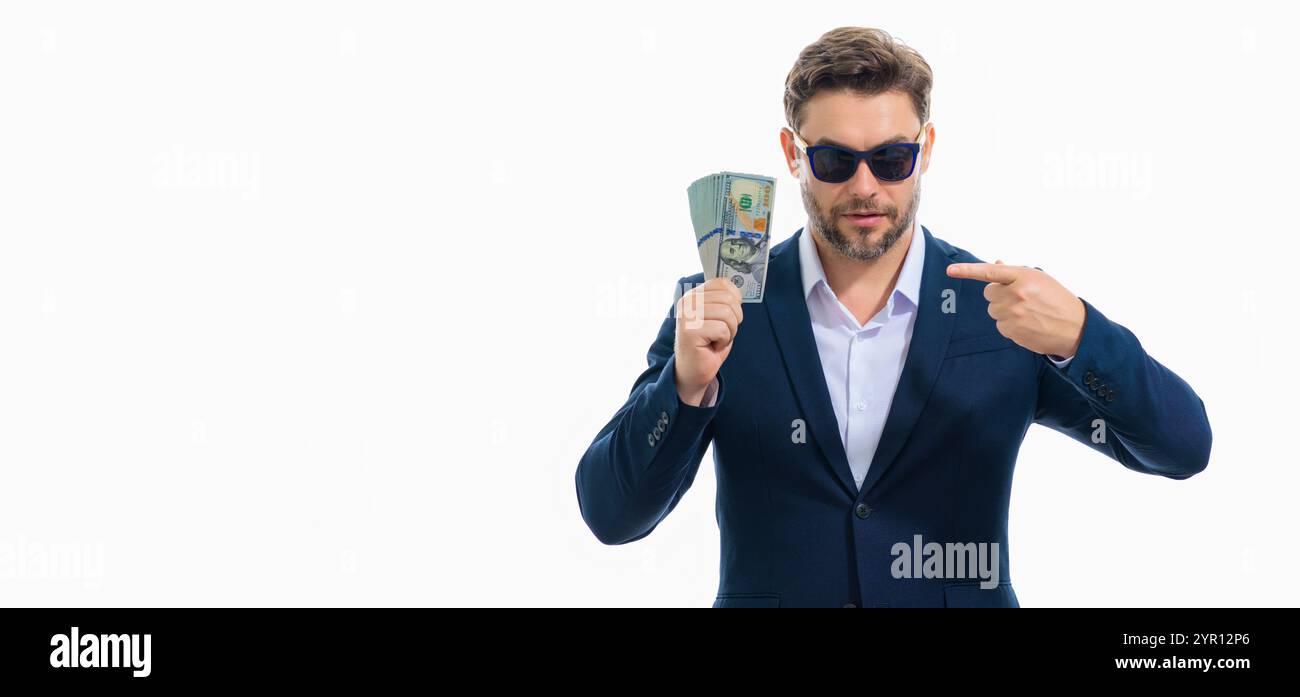 Man in suit with money cash. Dollar banknotes. Portrait of man holding ...