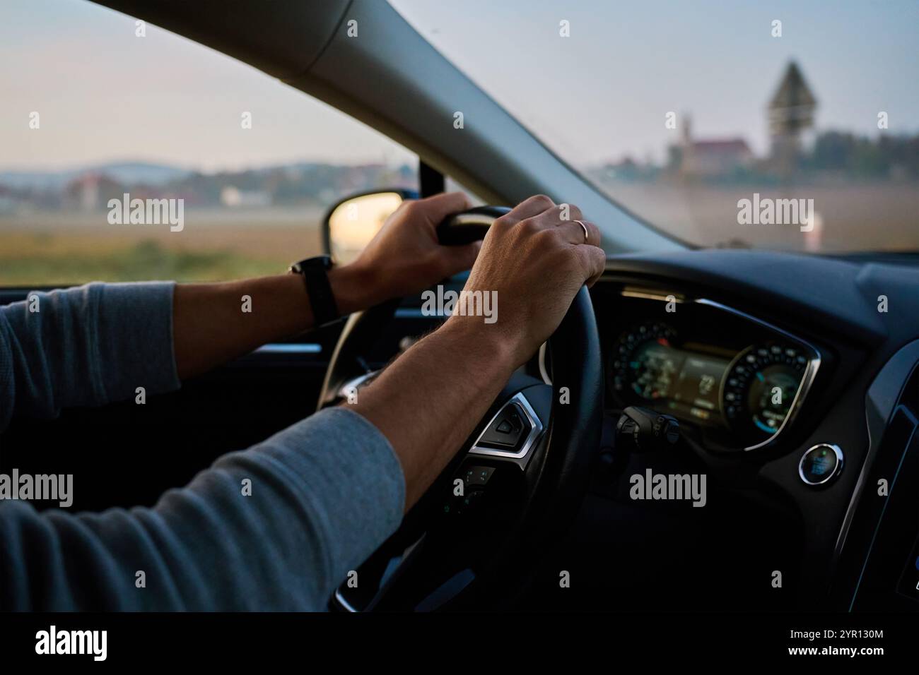 Male driver driving car, inside view. Man driving car on highway road ...