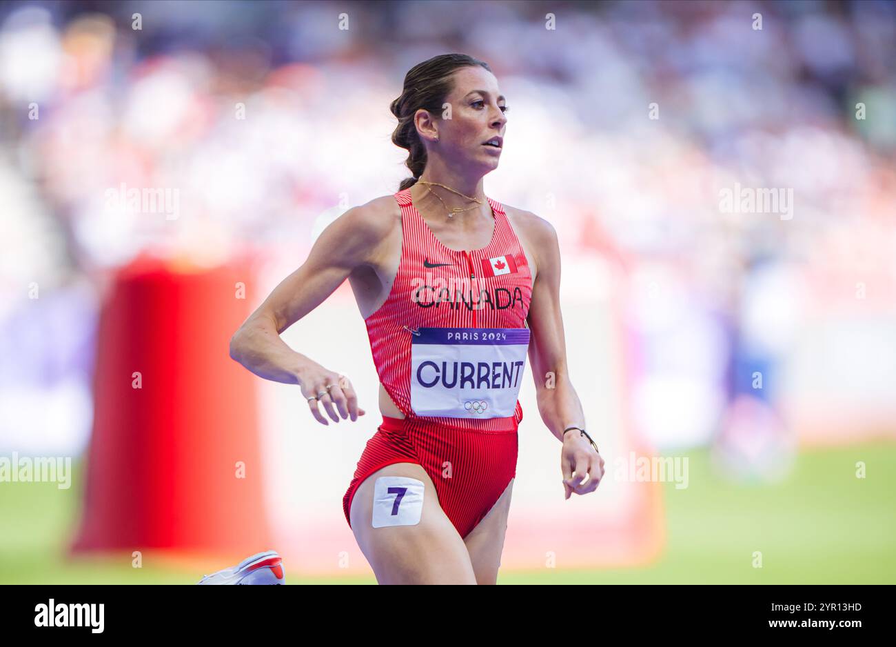 Kate Current participating in the 1500 meters at the Paris 2024 Olympic ...