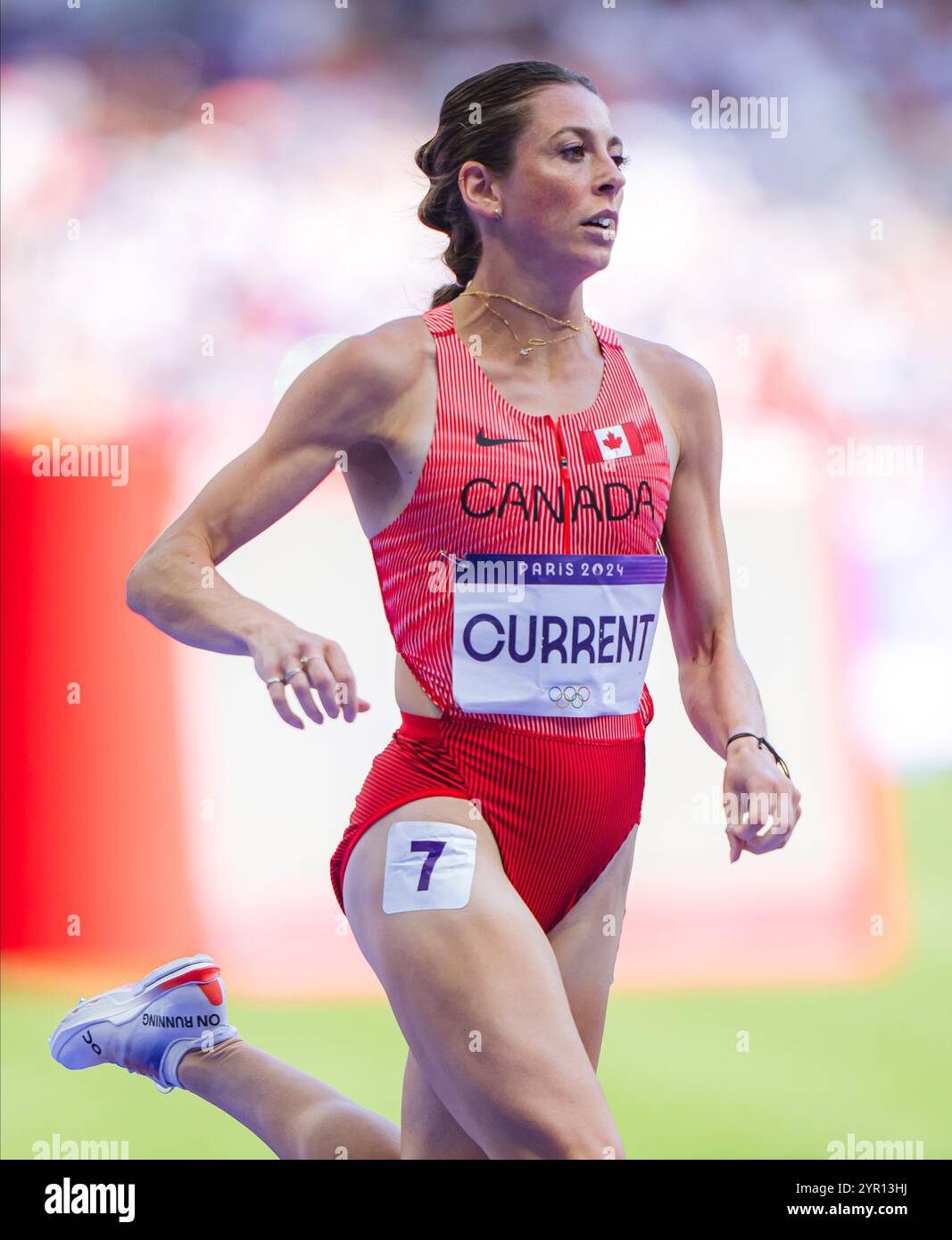 Kate Current participating in the 1500 meters at the Paris 2024 Olympic ...