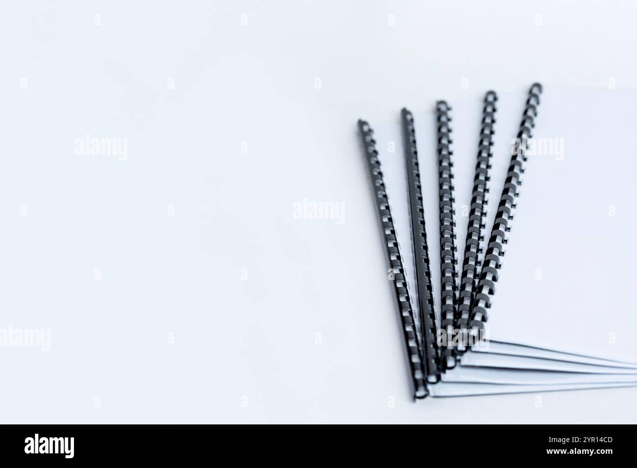 Binded documents with plastic spiral on white background Stock Photo ...