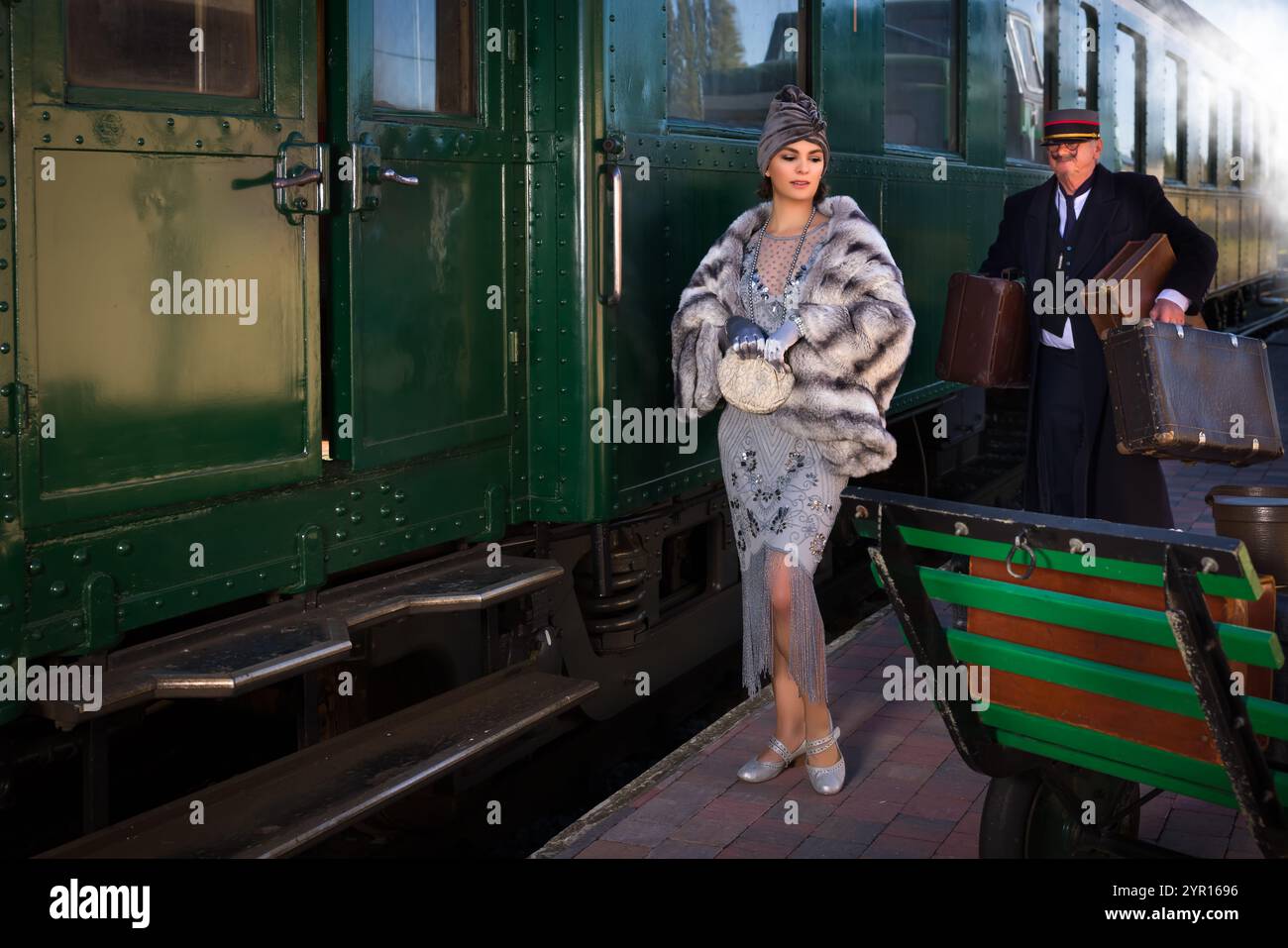 Reenactment scene on the platform near an authentic 1927 first class ...