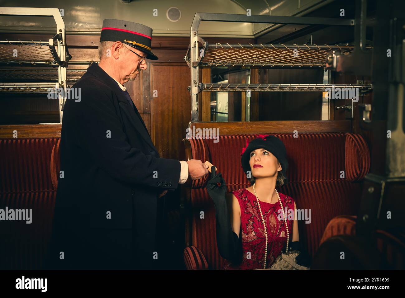 Reenactment scene of a vintage steam train conductor in a 1927 ...