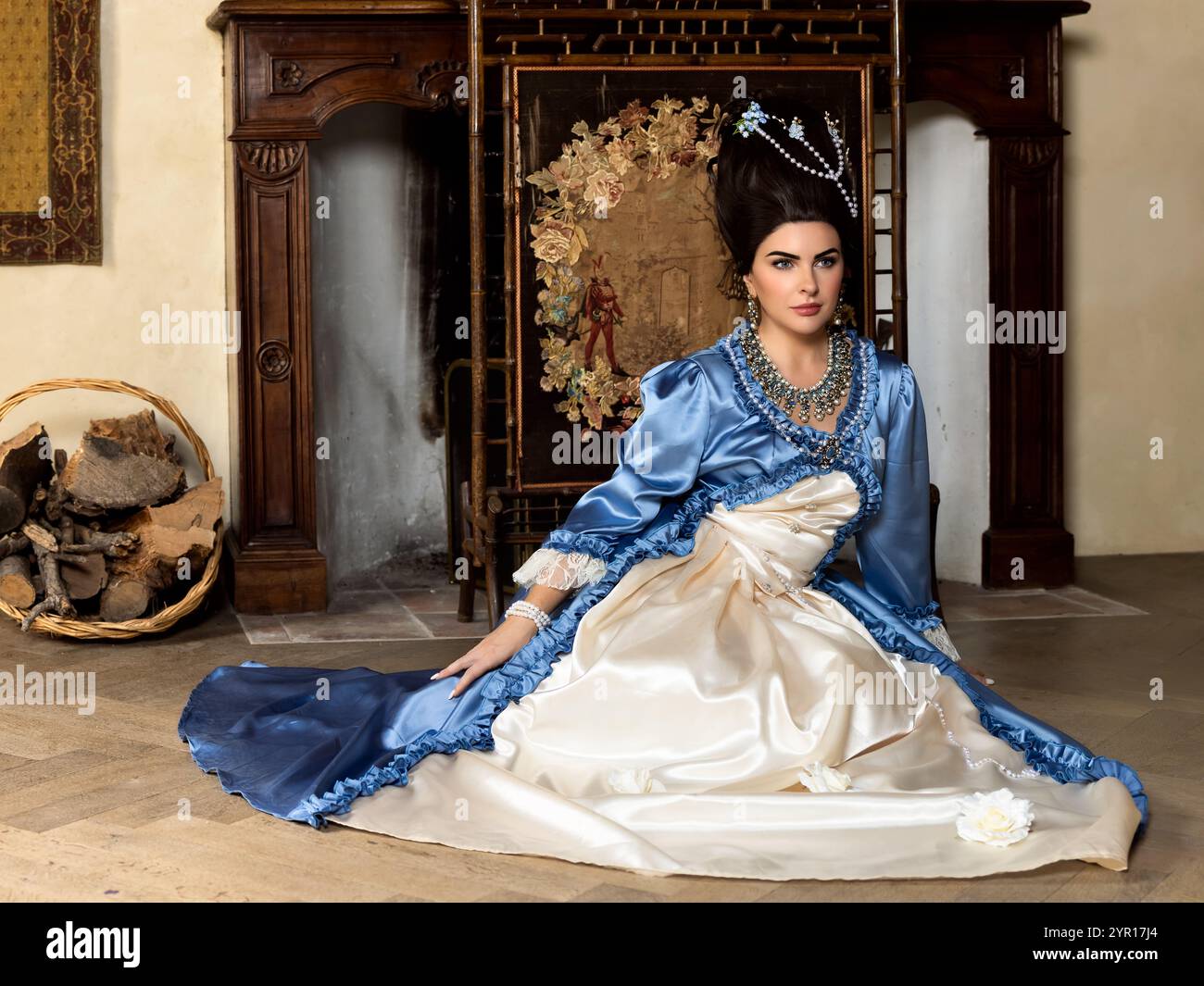 Beautiful young woman dressed in rococo queen Marie Antoinette style ...