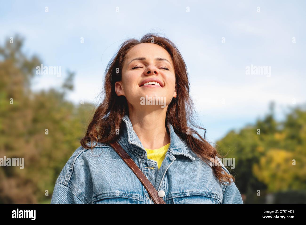 Portrait of urban woman enjoying a walk outside the city. Mental ...
