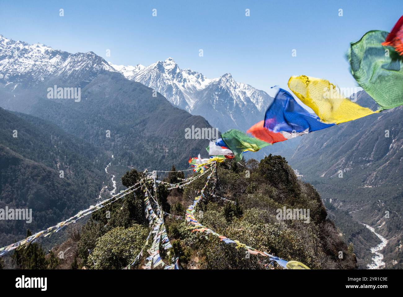 Prayer flags above the Tibetan village of Ghunsa on the Kangchenjunga ...