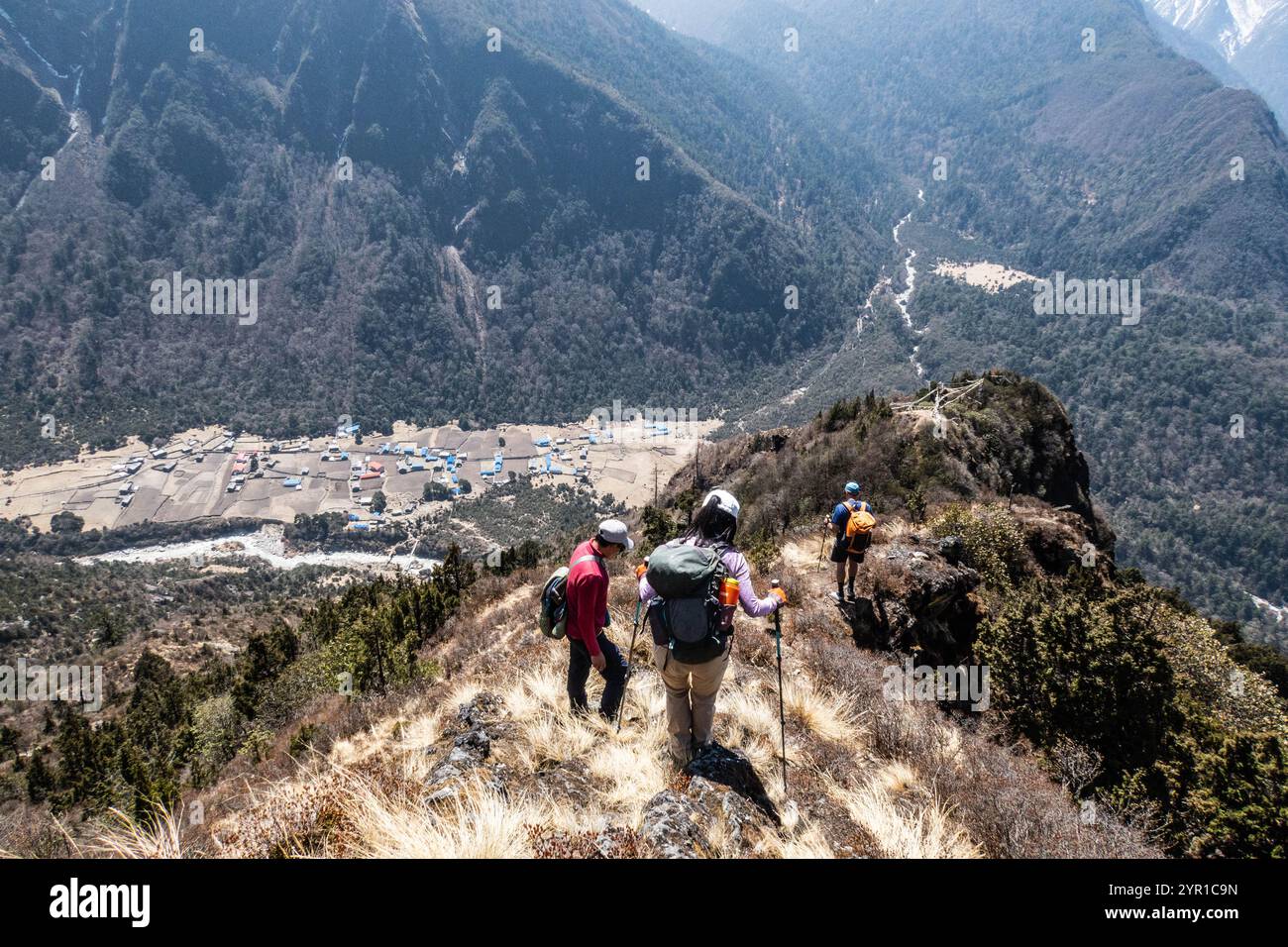 Trekkers descending down to the Tibetan village of Ghunsa on the ...