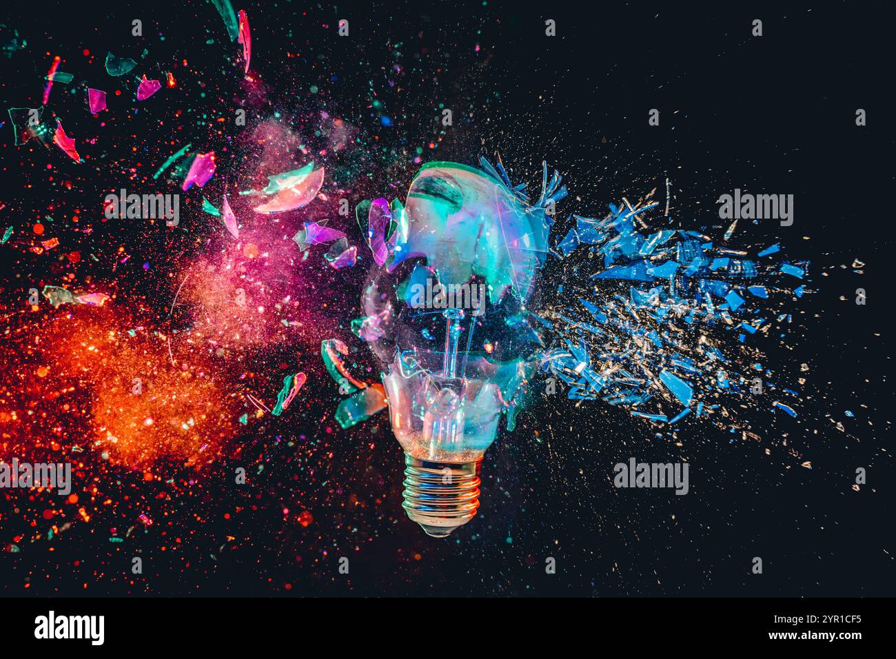Lightbulb exploding colorful burst powder glass black background Stock ...
