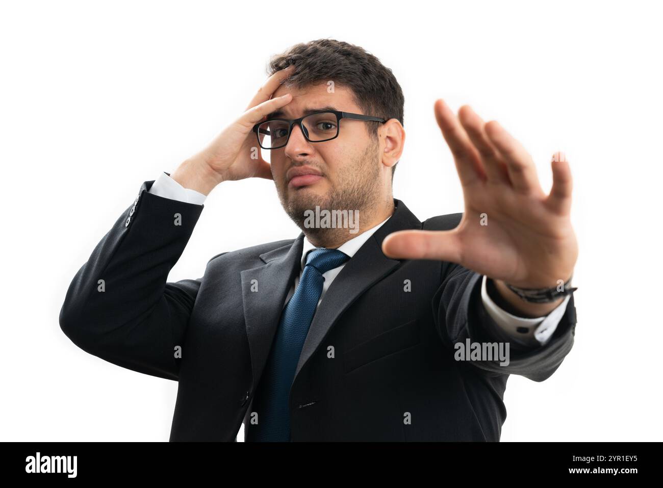 Adult businessman with scared expression wearing goggles or glasses and ...