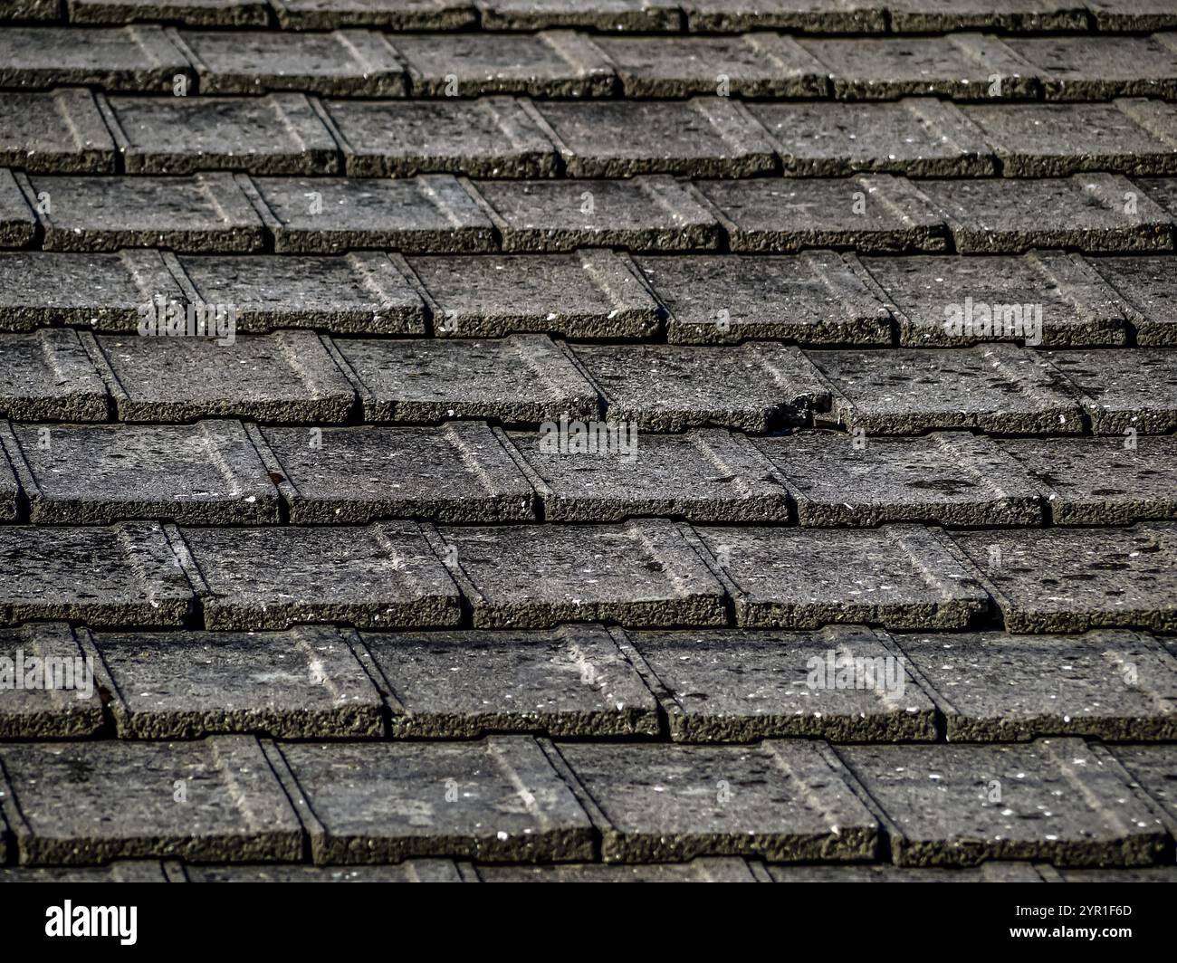 Detailed close-up image showing the textured surface of asphalt ...