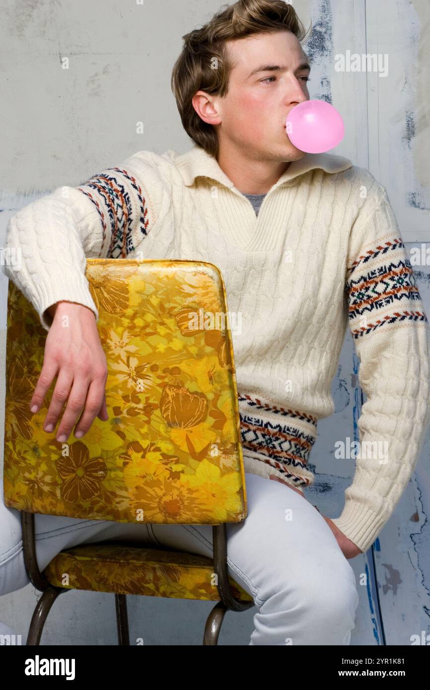 A male model blowing up a bubble during a photo shoot in Los Angeles ...