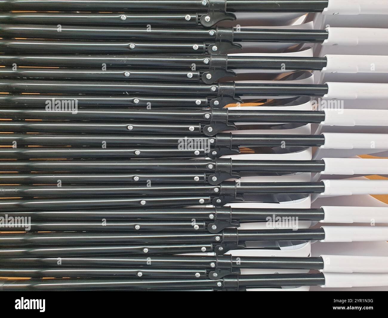 folding chairs. A stack of folding chairs in a sports hall after a ...