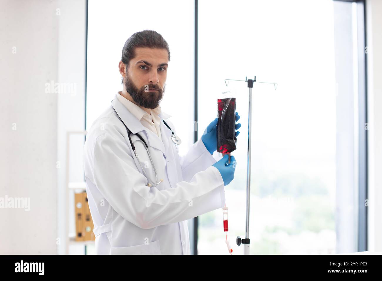 Iv blood bag dropper hi-res stock photography and images - Alamy