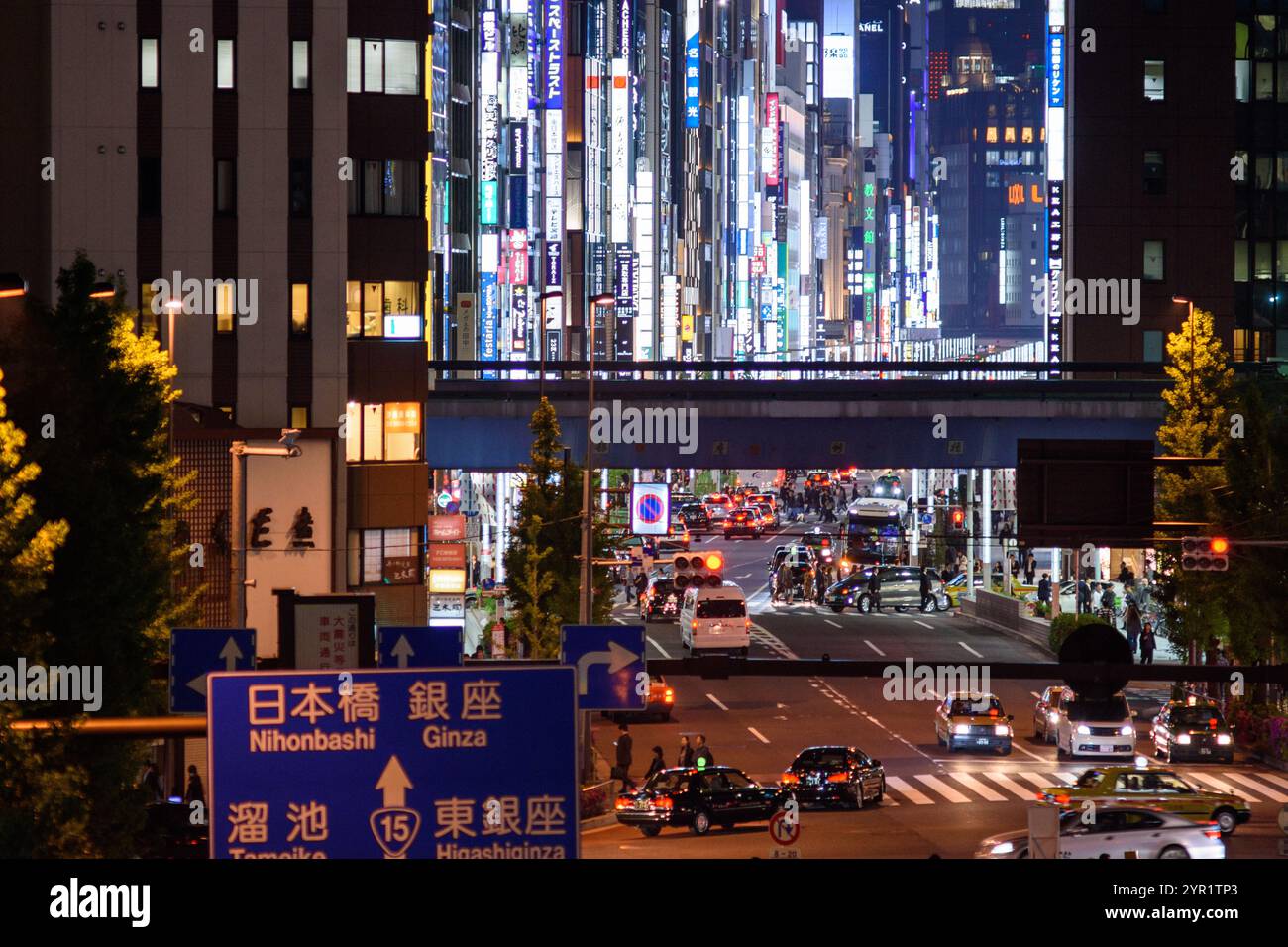 Night view of neon advertisement lights of the trendsetting Ginza shopping area in central Tokyo ...