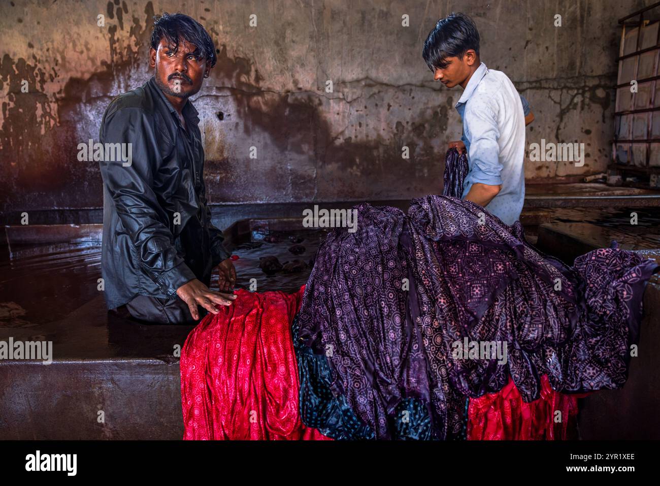 Portrait of two Indian textile dyeing workers, Gujarat, India Stock ...