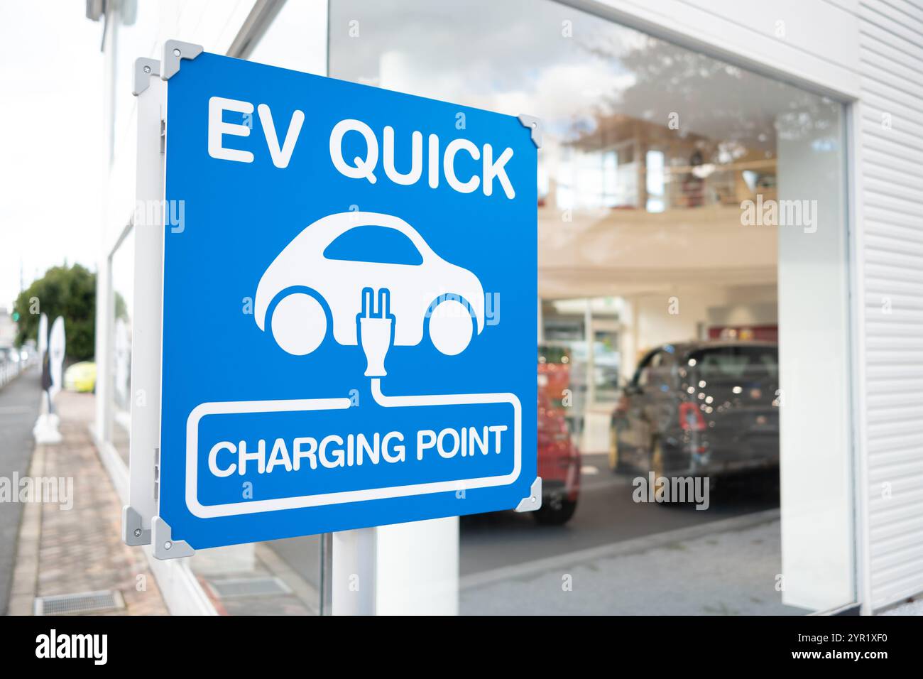 EV Quick charging point sign. Electric vehicle charging station Stock Photo - Alamy