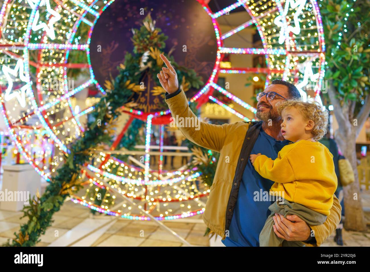 Father son during christmas hi-res stock photography and images - Alamy
