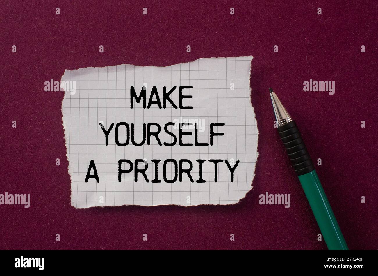 Make yourself a priority message written on ripped torn paper piece ...