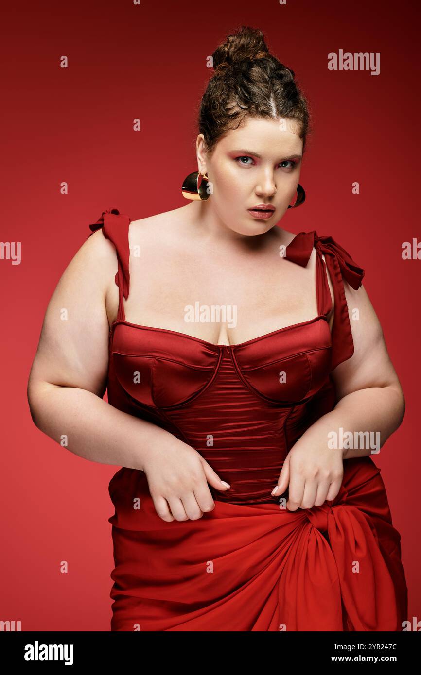 Trendy woman in a vibrant red dress showcases her style and confidence ...