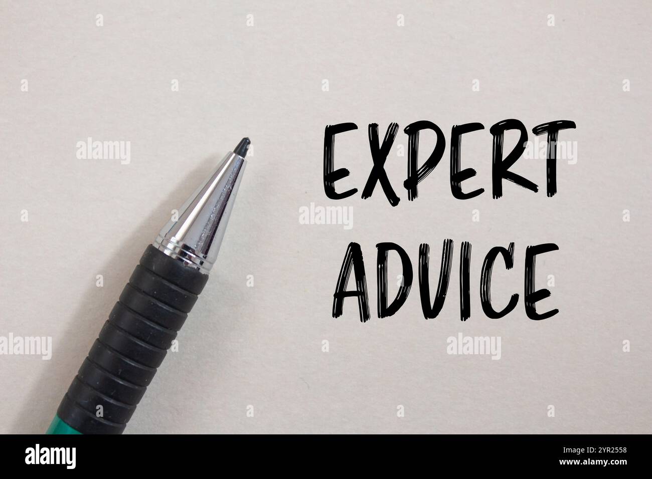 Expert advice message written on white paper with a pen. Conceptual ...