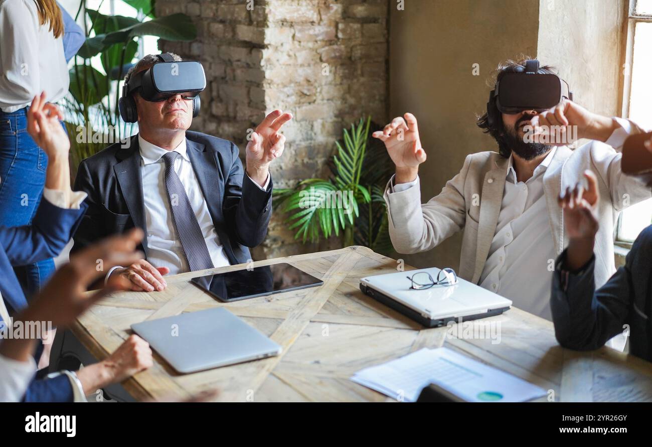 Business people wearing vr goggles inside office - New AI technology ...