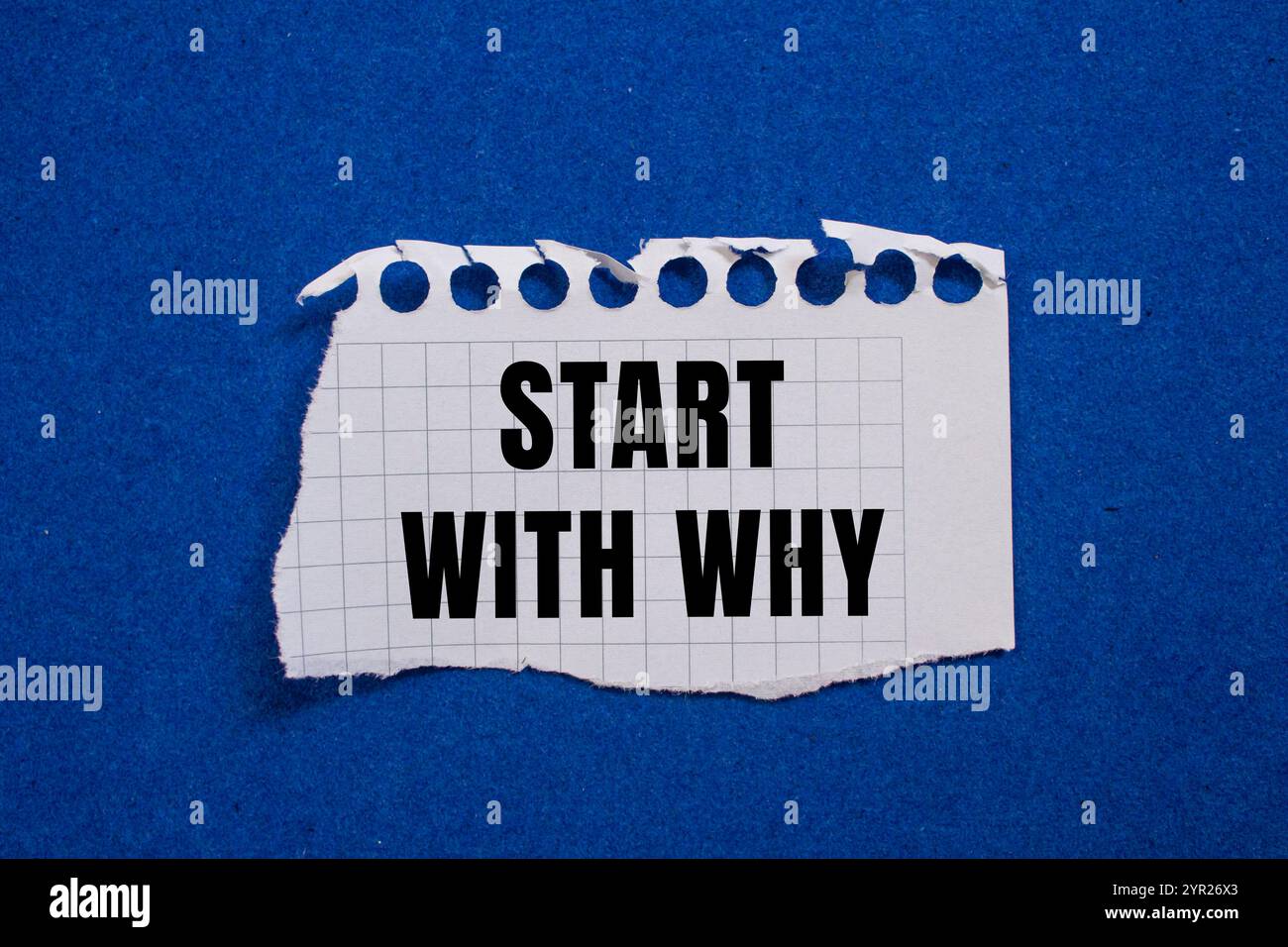 Start with why message written on ripped torn paper piece with blue background. Conceptual start ...