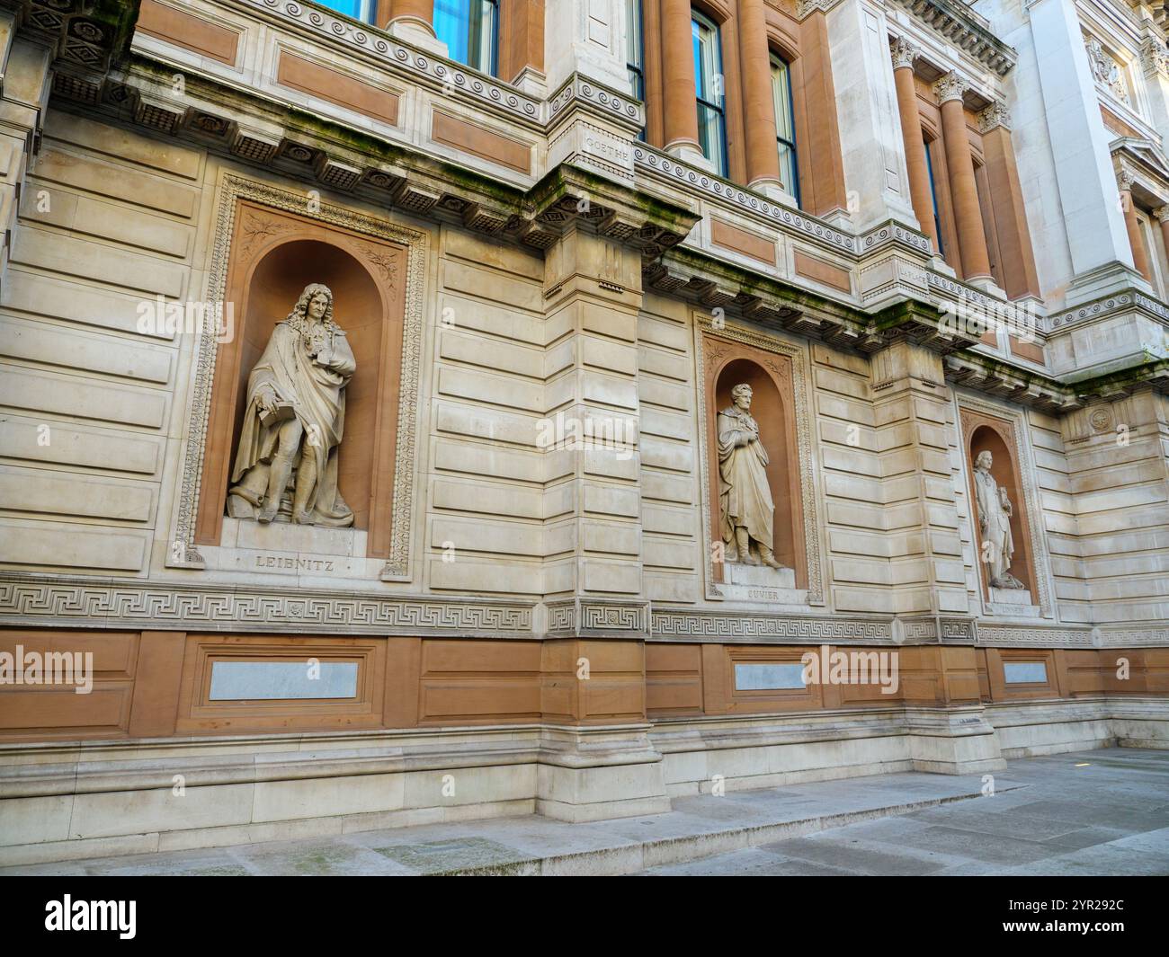 Statues of historical figures outside The Royal Academy of Arts, London ...
