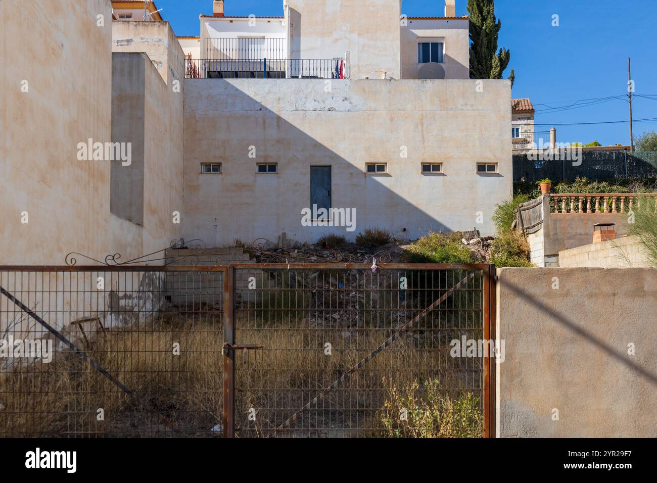 Mind your step, Spanish house with door opening to no where Stock Photo ...
