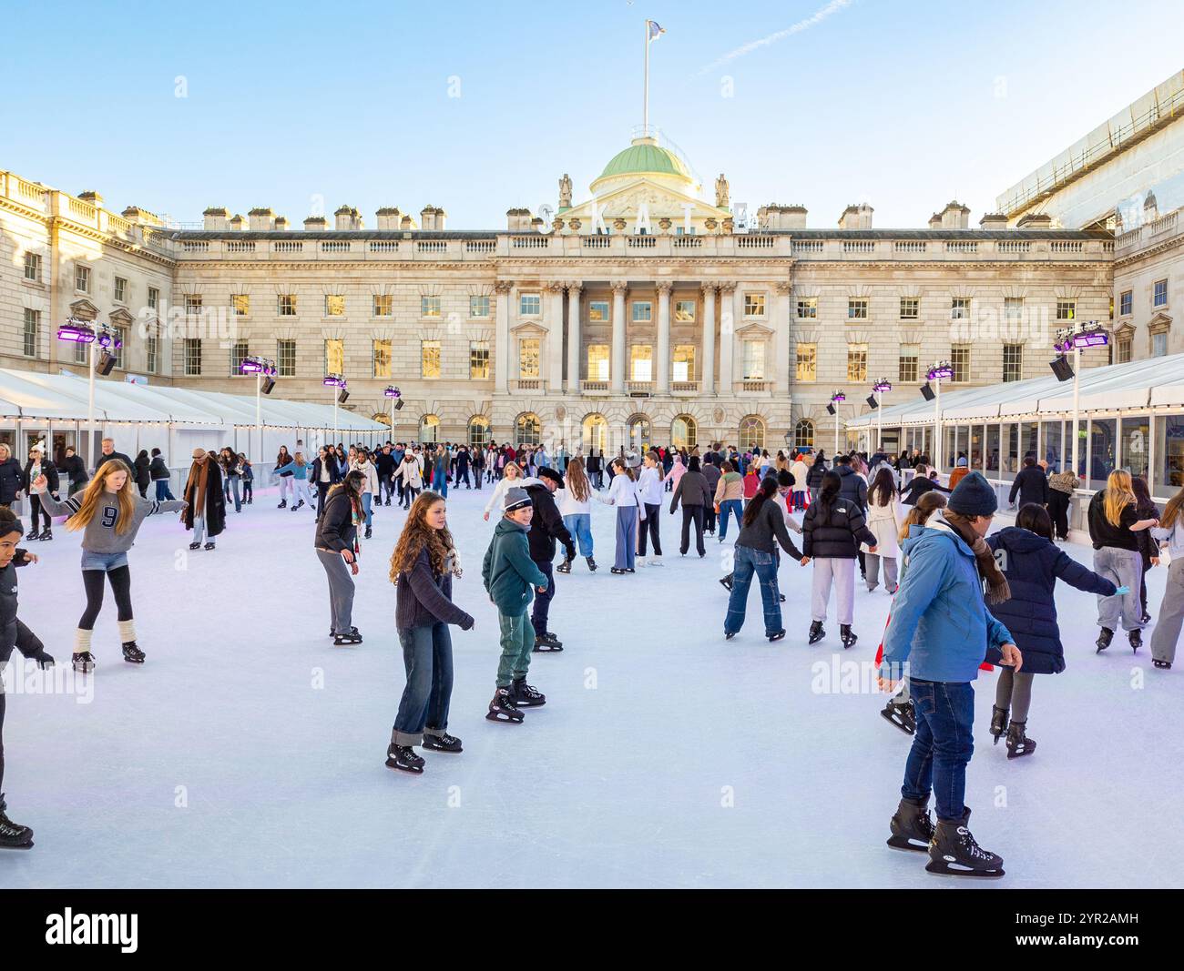 People skating at the Somerset House outdoor ice skating rink, London ...