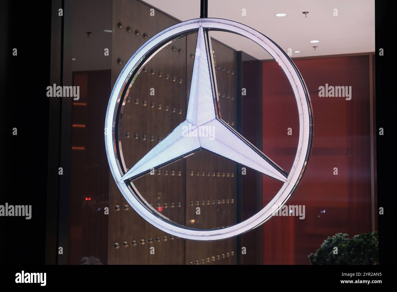 Mercedes-Benz company brand logo close up Stock Photo - Alamy