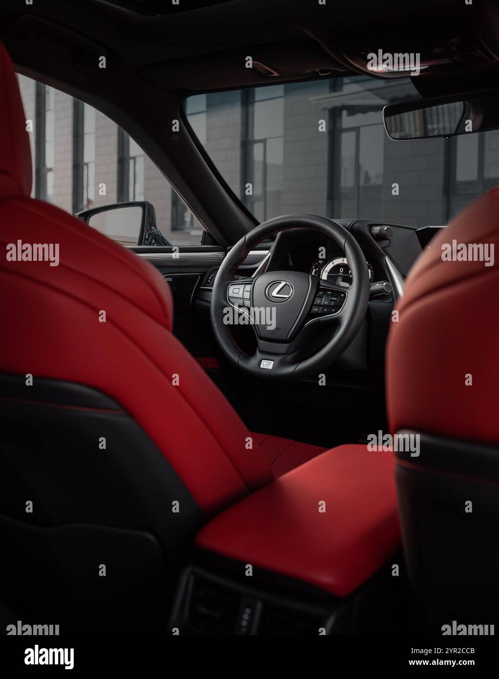 Interior of Lexus ES in a city. Red leather seats and dashboard of ...