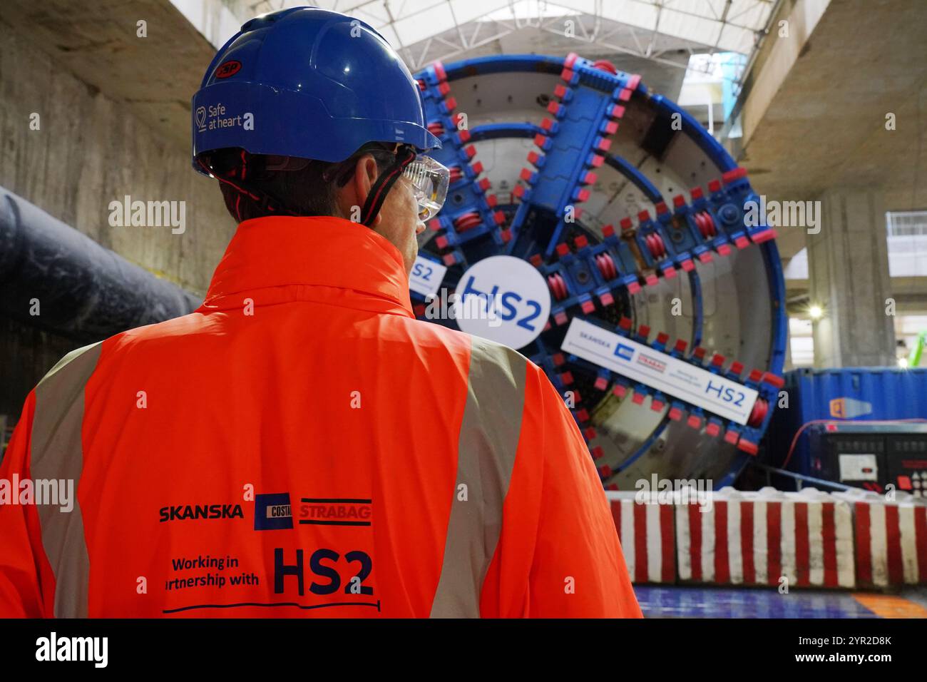 An HS2 worker stands in front of tunnel boring machine Karen at the Old ...