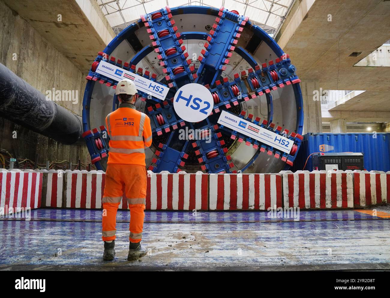 An HS2 worker stands in front of tunnel boring machine Karen at the Old ...