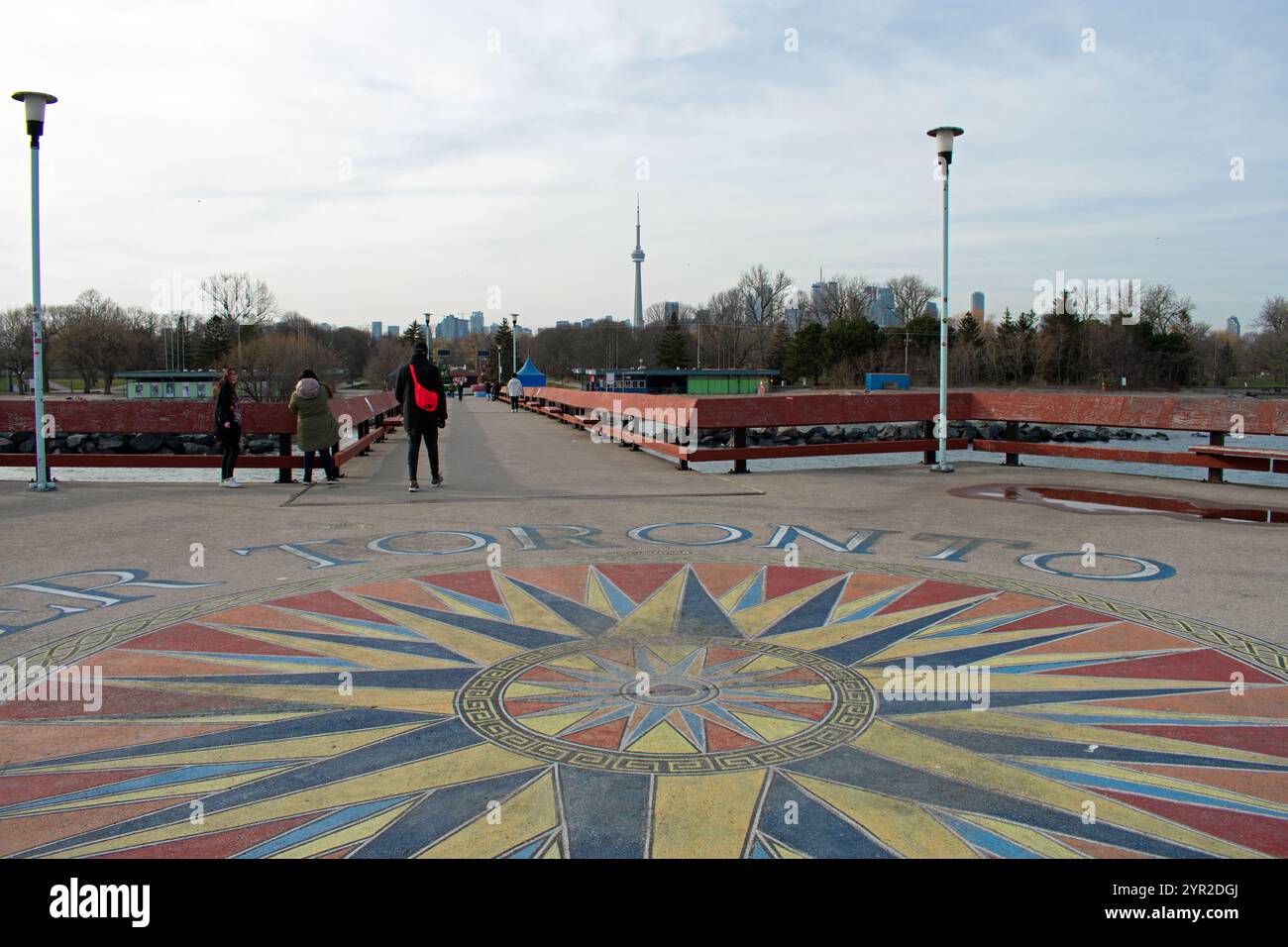 The observation deck on Centre Island Pier. A male can be seen walking ...