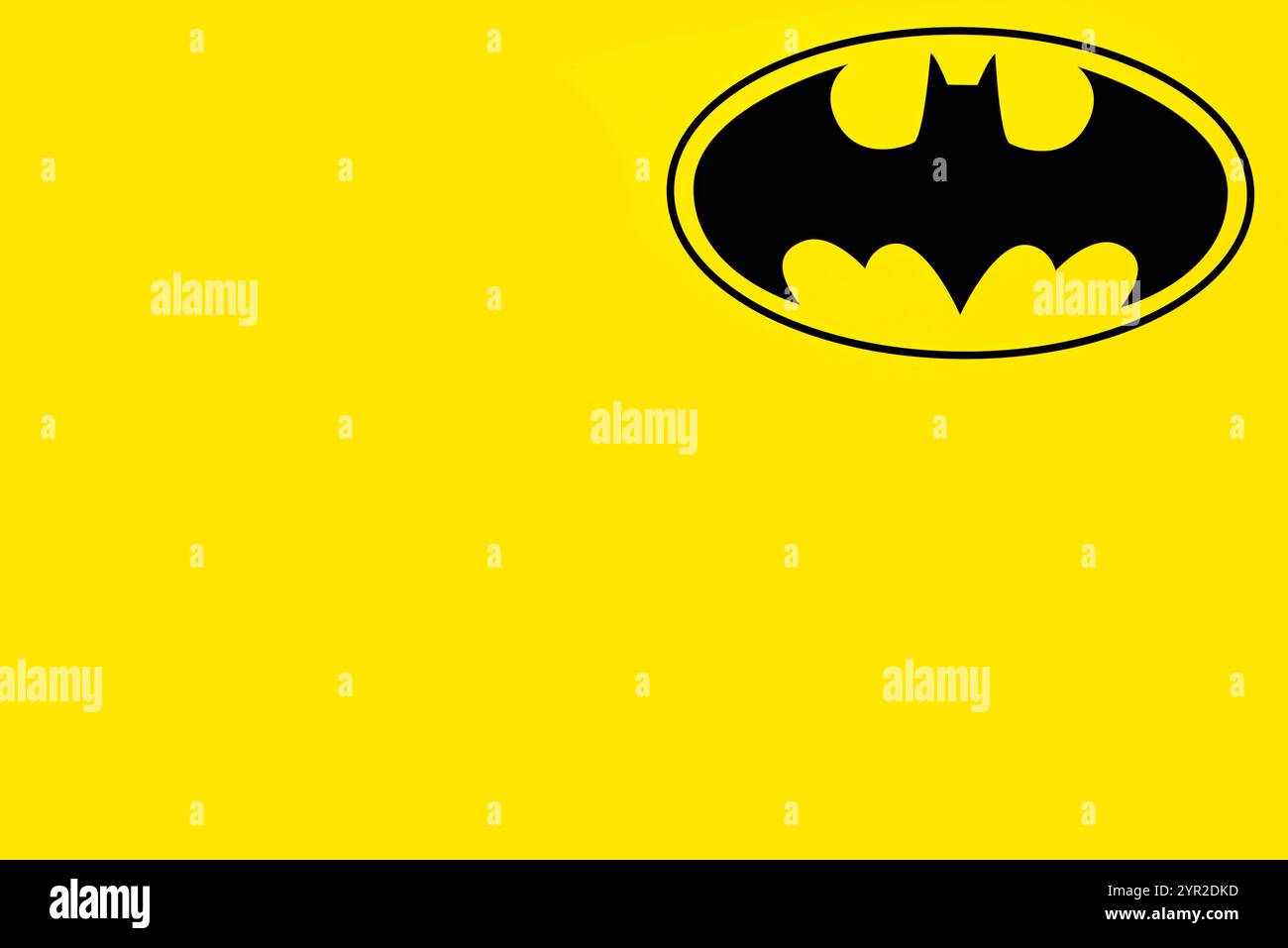 Classic Batman logo isolated on a bright yellow background Stock Photo ...