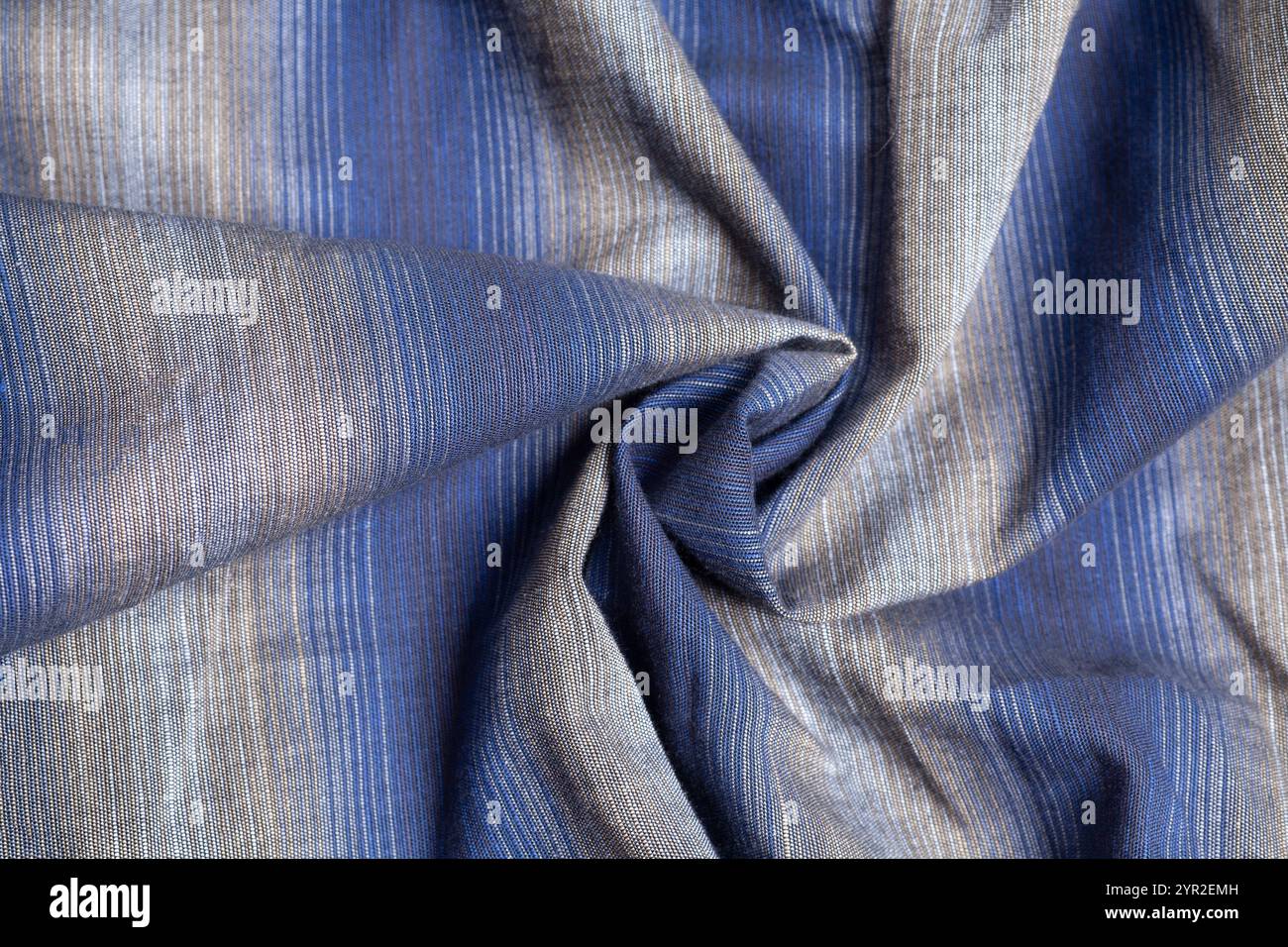 Gray blue fabric cloth texture with spiral folds Stock Photo - Alamy