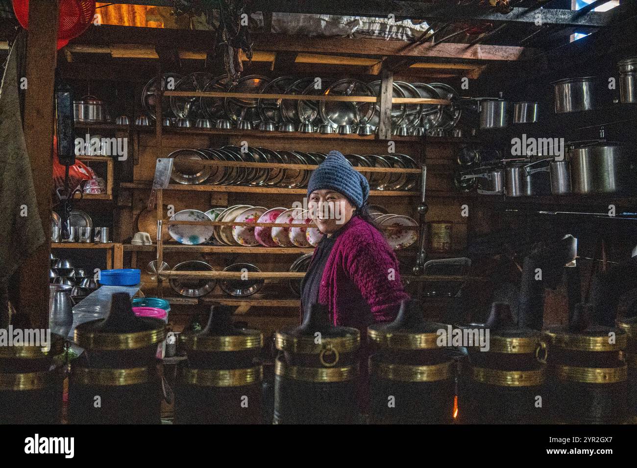 Traditional teahouse kitchen with tongba millet alcohol vessels on the ...