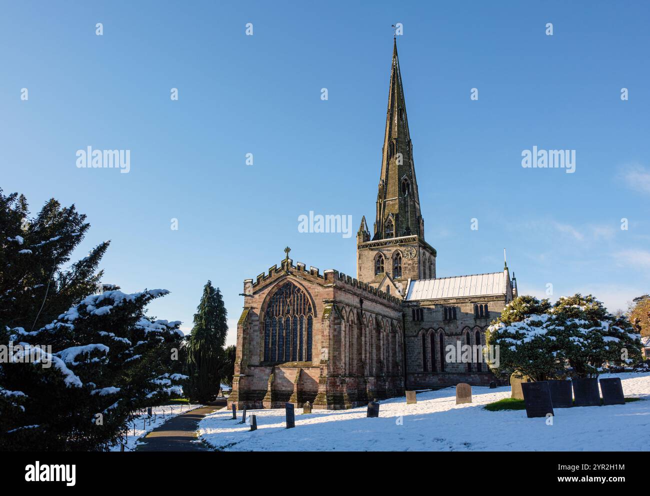 St Oswald's Church after a fall of snow, Ashbourne, Derbyshire Stock ...