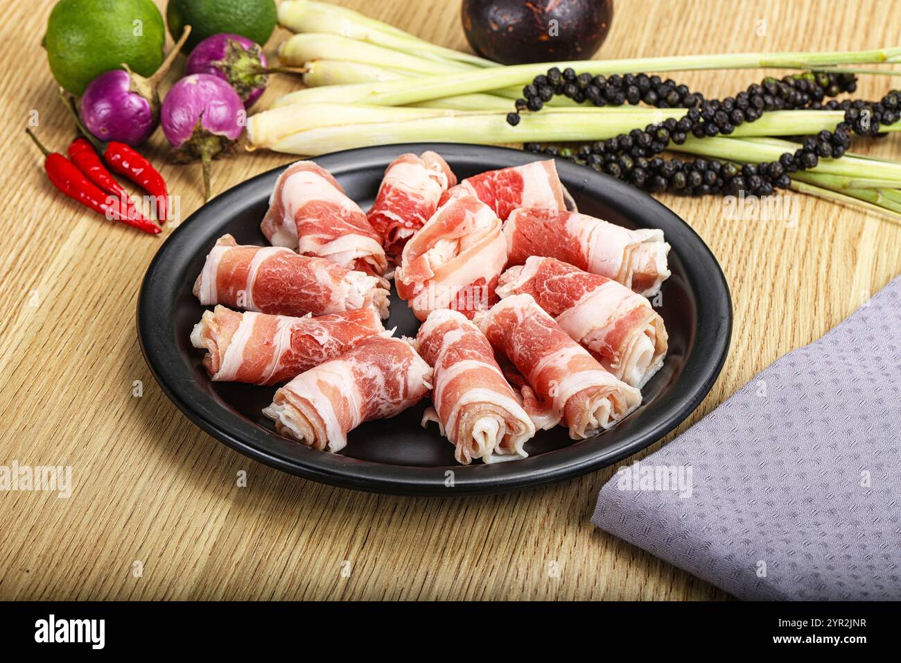 Raw beef bacon roll for grill Stock Photo - Alamy