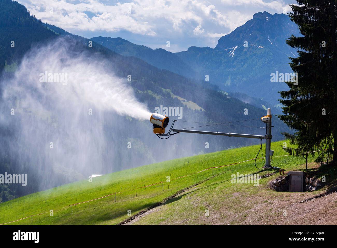 Snow making machines on slope on sunny day, snow cannon, snow gun Stock ...