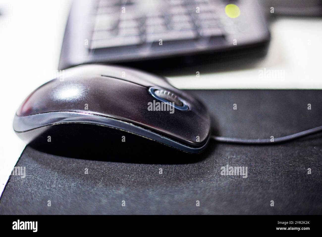 computer stylish wired mouse on a dark background. Orgonomics of the ...