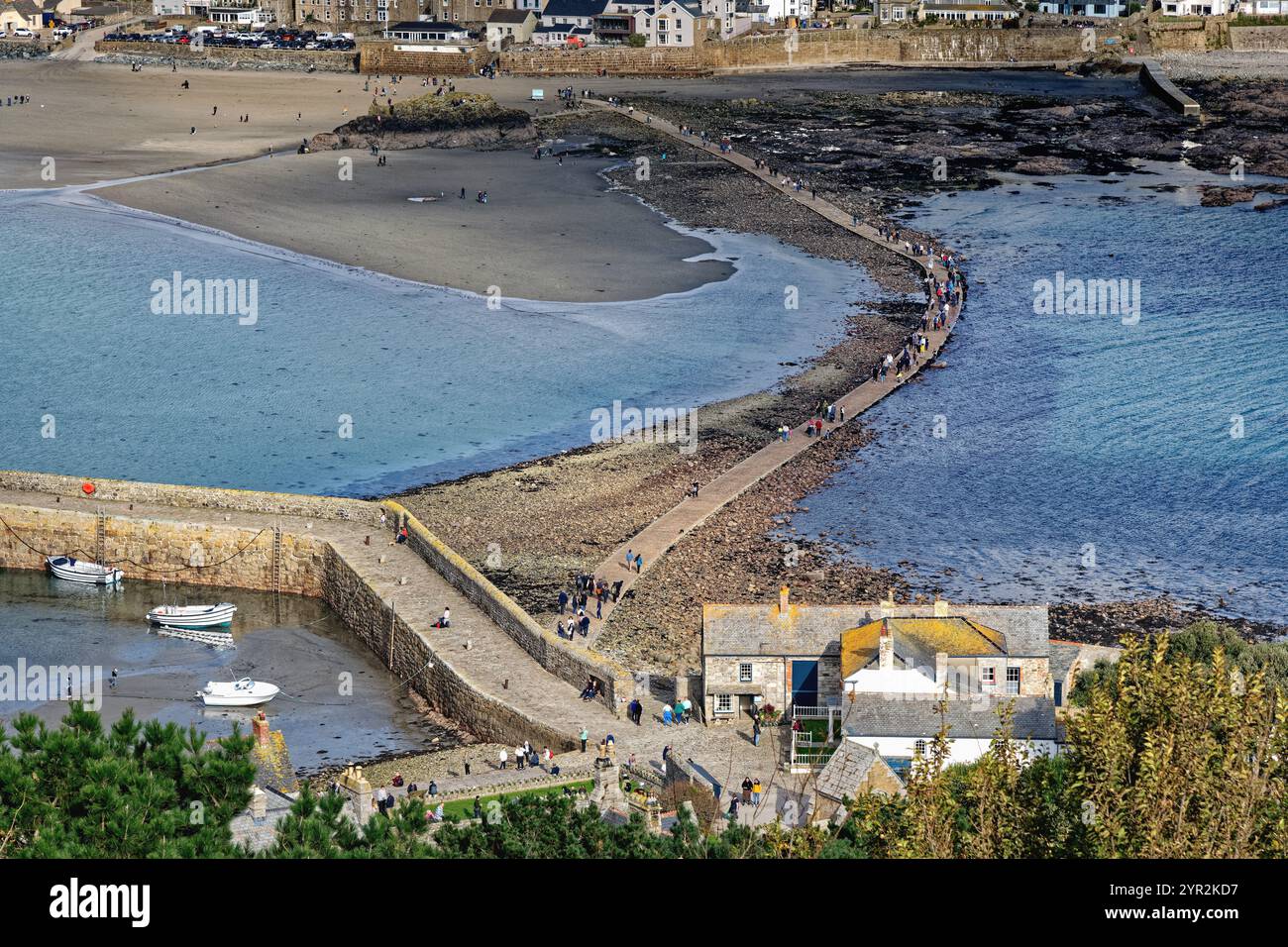People walking on the public causeway between St Michaels mount and the ...