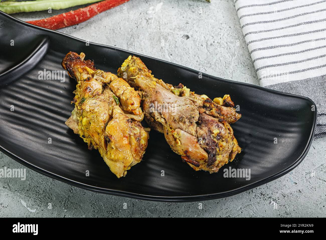 Indian Chicken leg tikka with spices Stock Photo - Alamy