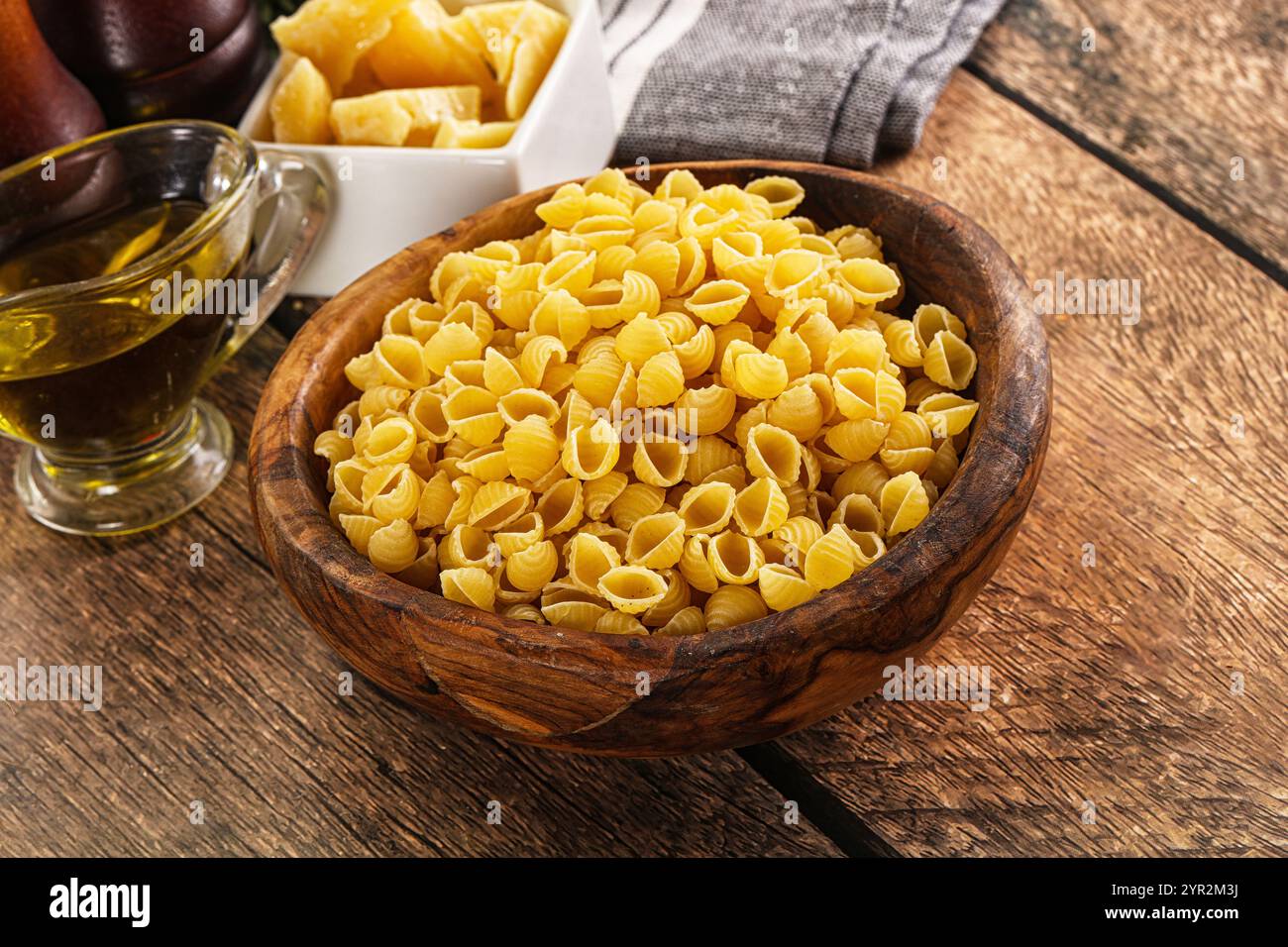 Italian cuisine - dry conchiglie shell pasta Stock Photo - Alamy